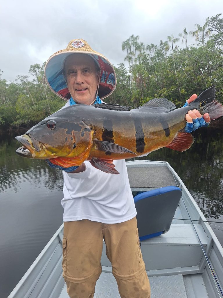 A BROKEN ROD AND A BIG GRIN - River Plate Anglers